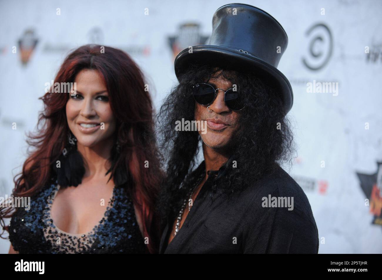 LOS ANGELES, CA - SEPTEMBER 10: Perla Ferrar and Slash arrive at the ...
