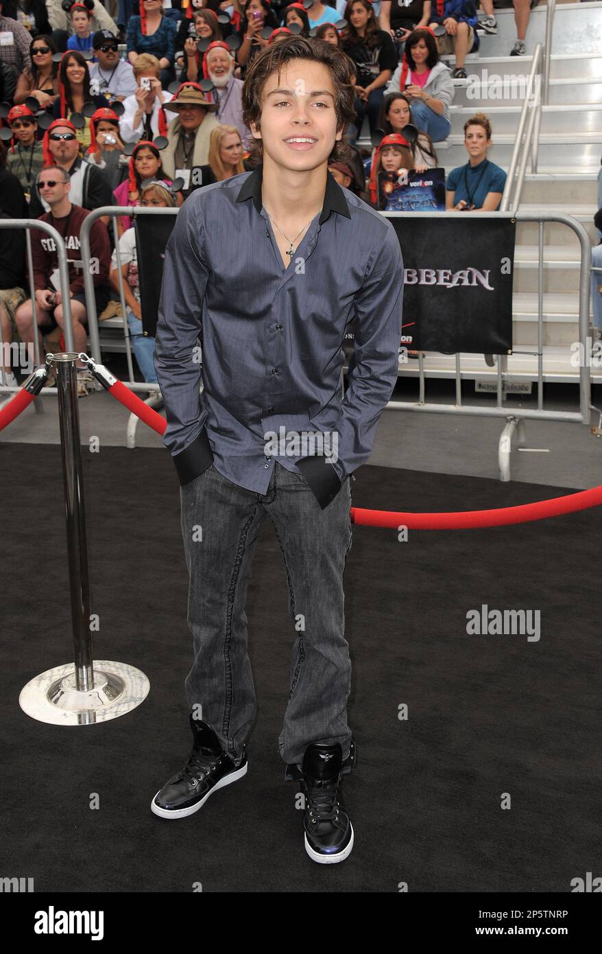 ANAHEIM, CA - MAY 07: Actor Jake T. Austin arrives at the premiere of ...