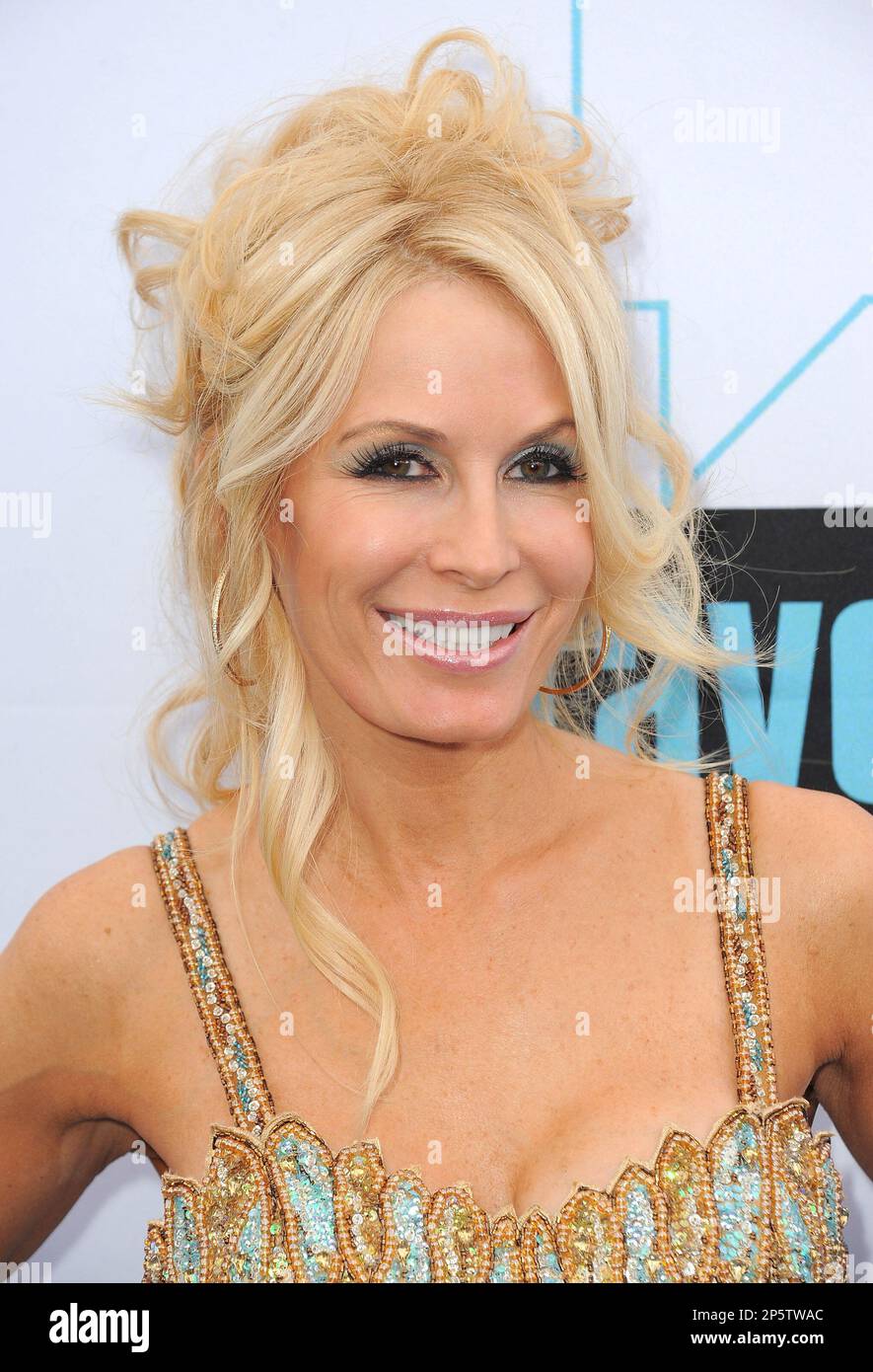 HOLLYWOOD, CA - MARCH 30: Peggy Tanous arrives at Bravo Media's 2011 ...