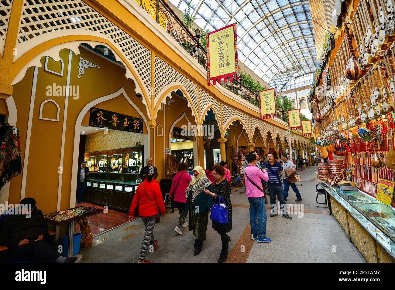 Tourists at Grand Bazaar in Xinjiang, China Stock Photo - Alamy
