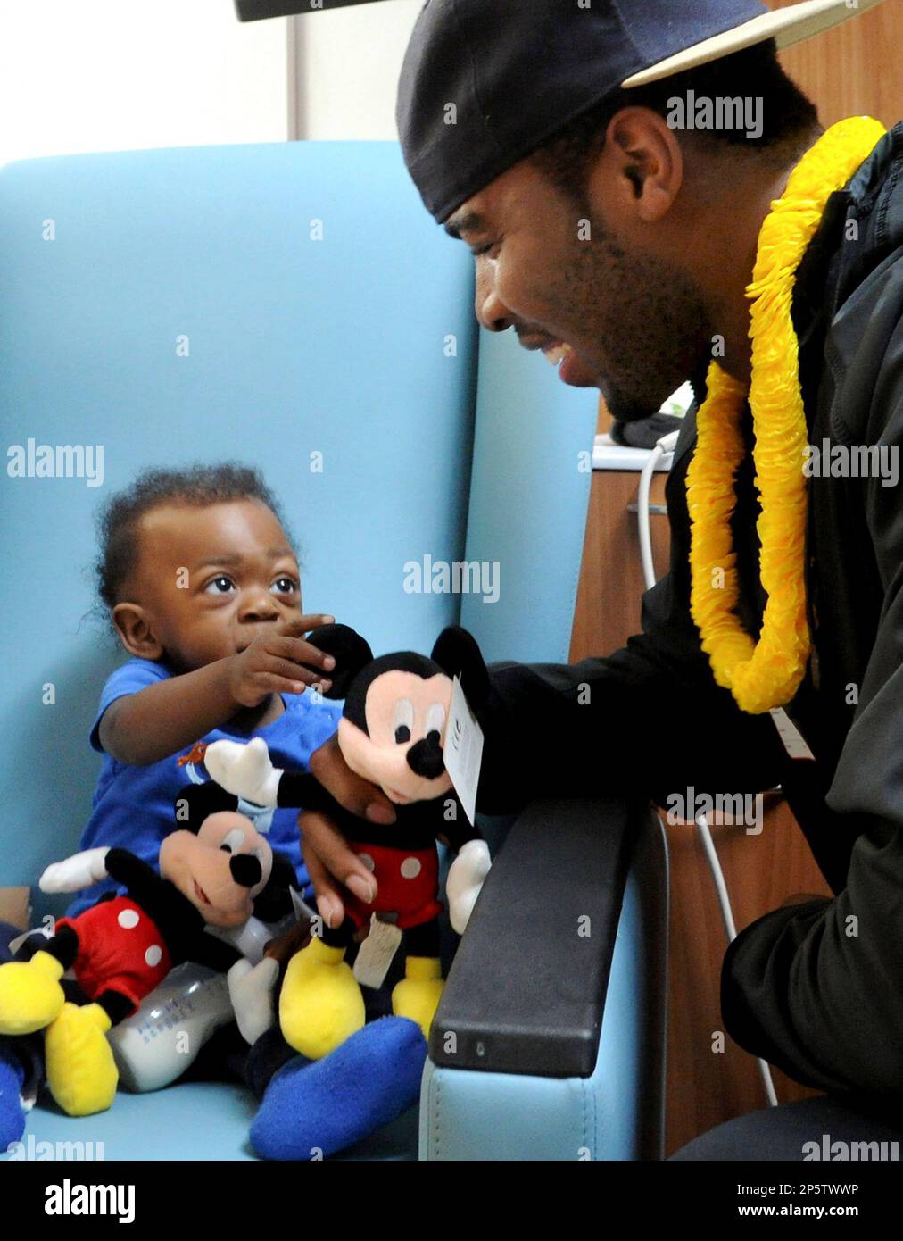 Patient Logan Pratcher-Smith, 1, receives a toy from Pittsburgh ...