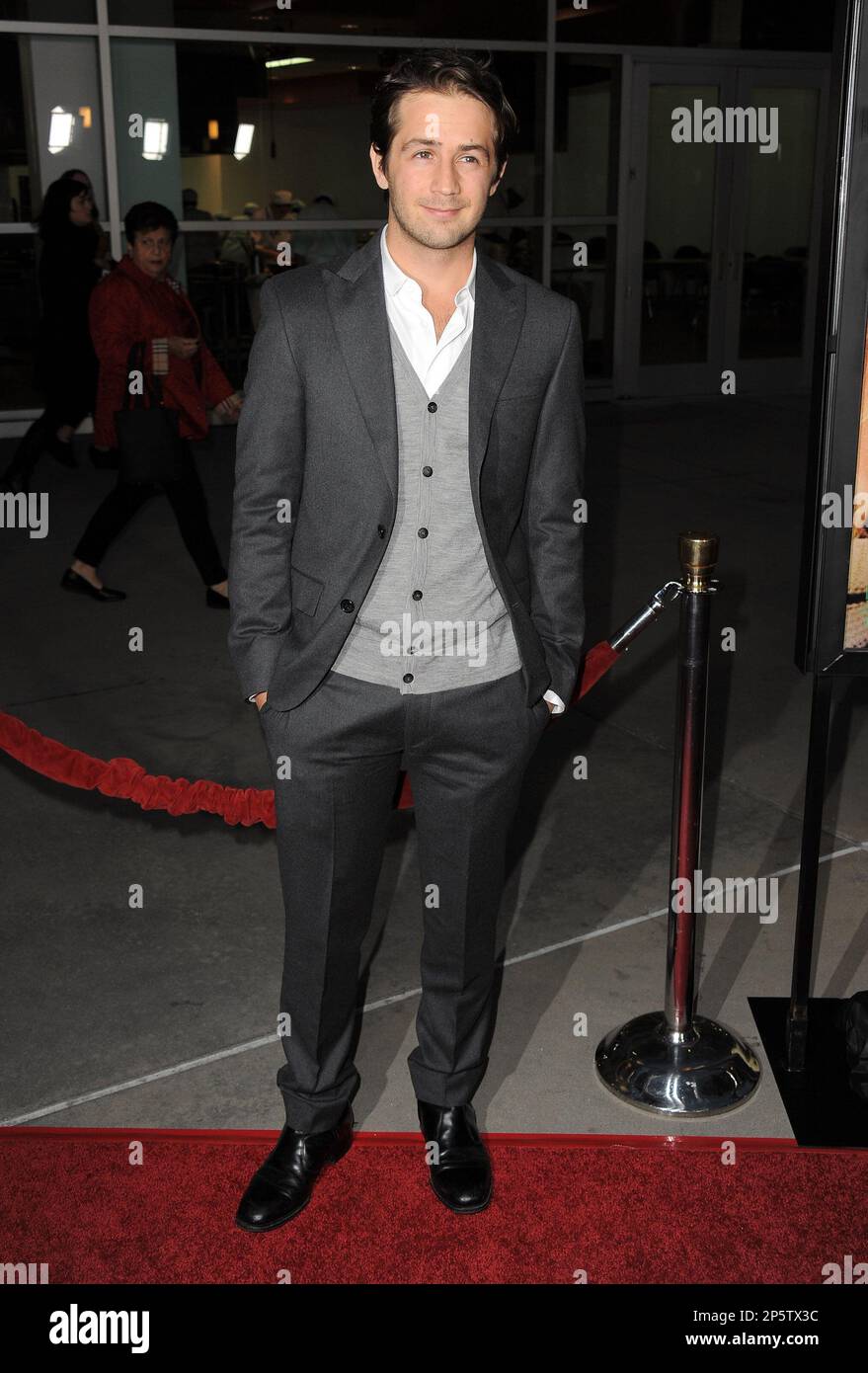 HOLLYWOOD, CA - MARCH 22: Actor Michael Angarano arrives at the ...