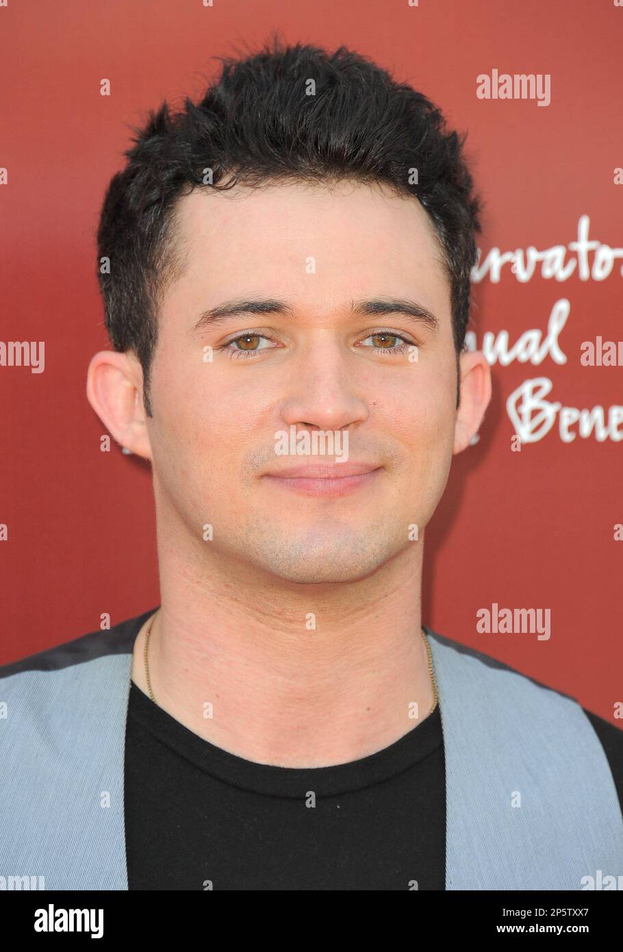 LOS ANGELES, CA - MARCH 13: Actor Justin Willman arrives at the John ...