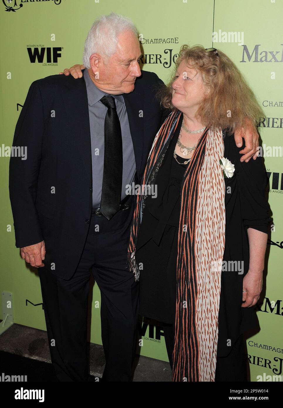 WEST HOLLYWOOD, CA - FEBRUARY 25: David Seidler and Jenny Beavan arrive ...