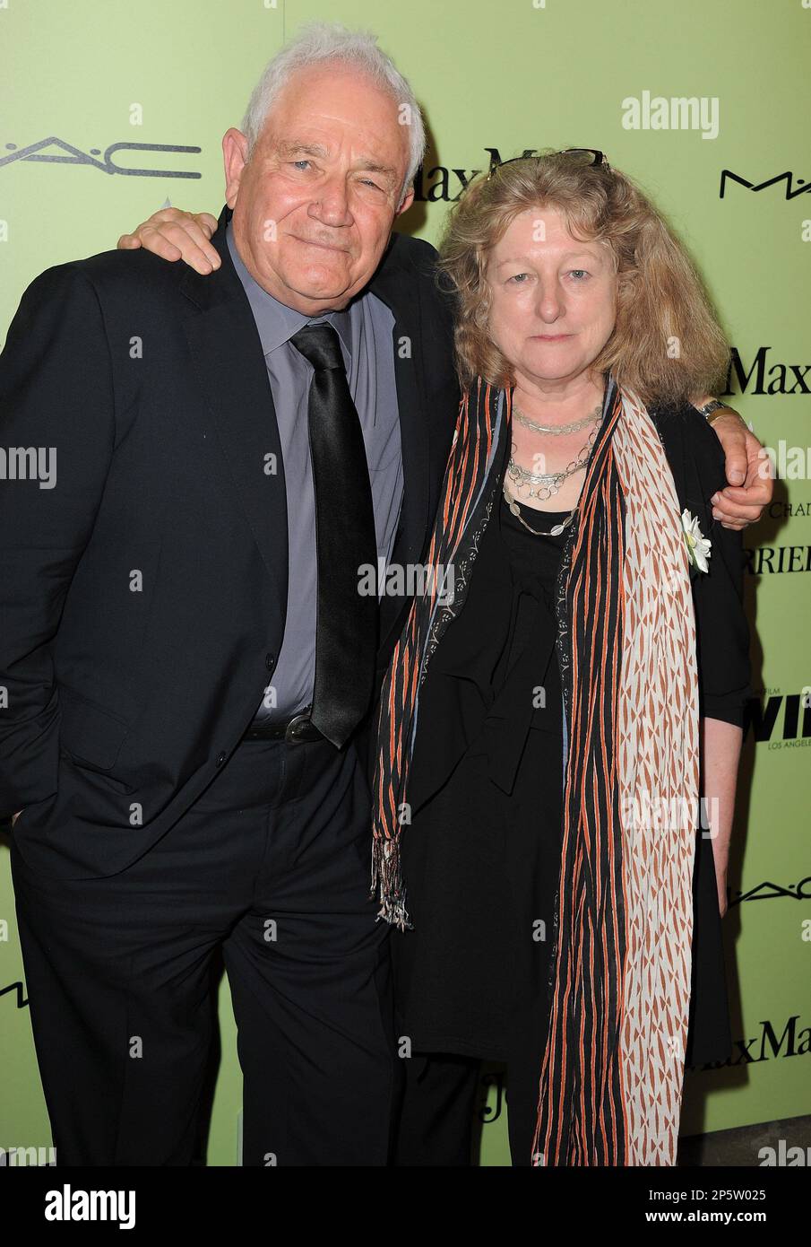WEST HOLLYWOOD, CA - FEBRUARY 25: David Seidler and Jenny Beavan arrive ...