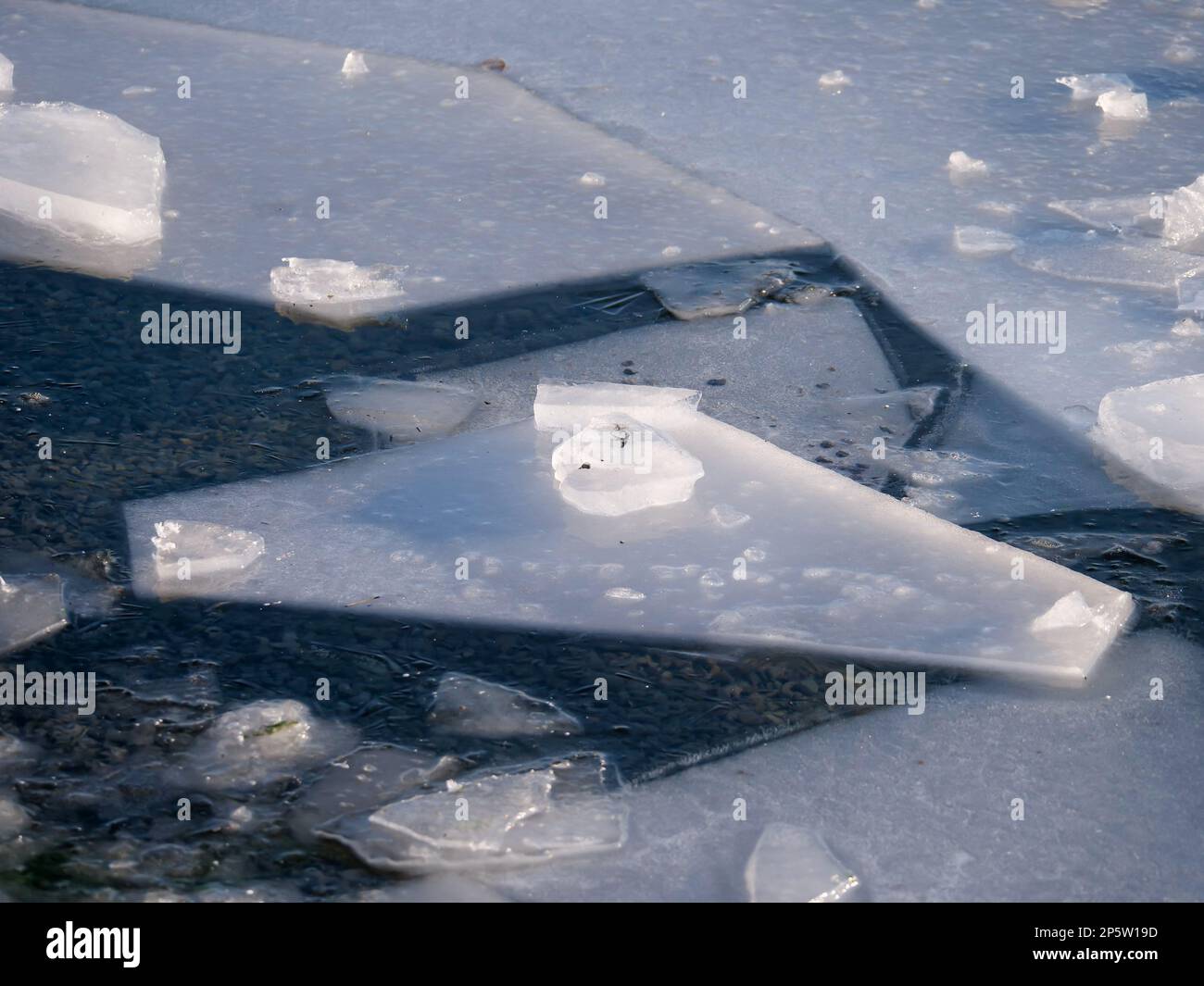 The frozen lake with its chunks of ice Stock Photo - Alamy