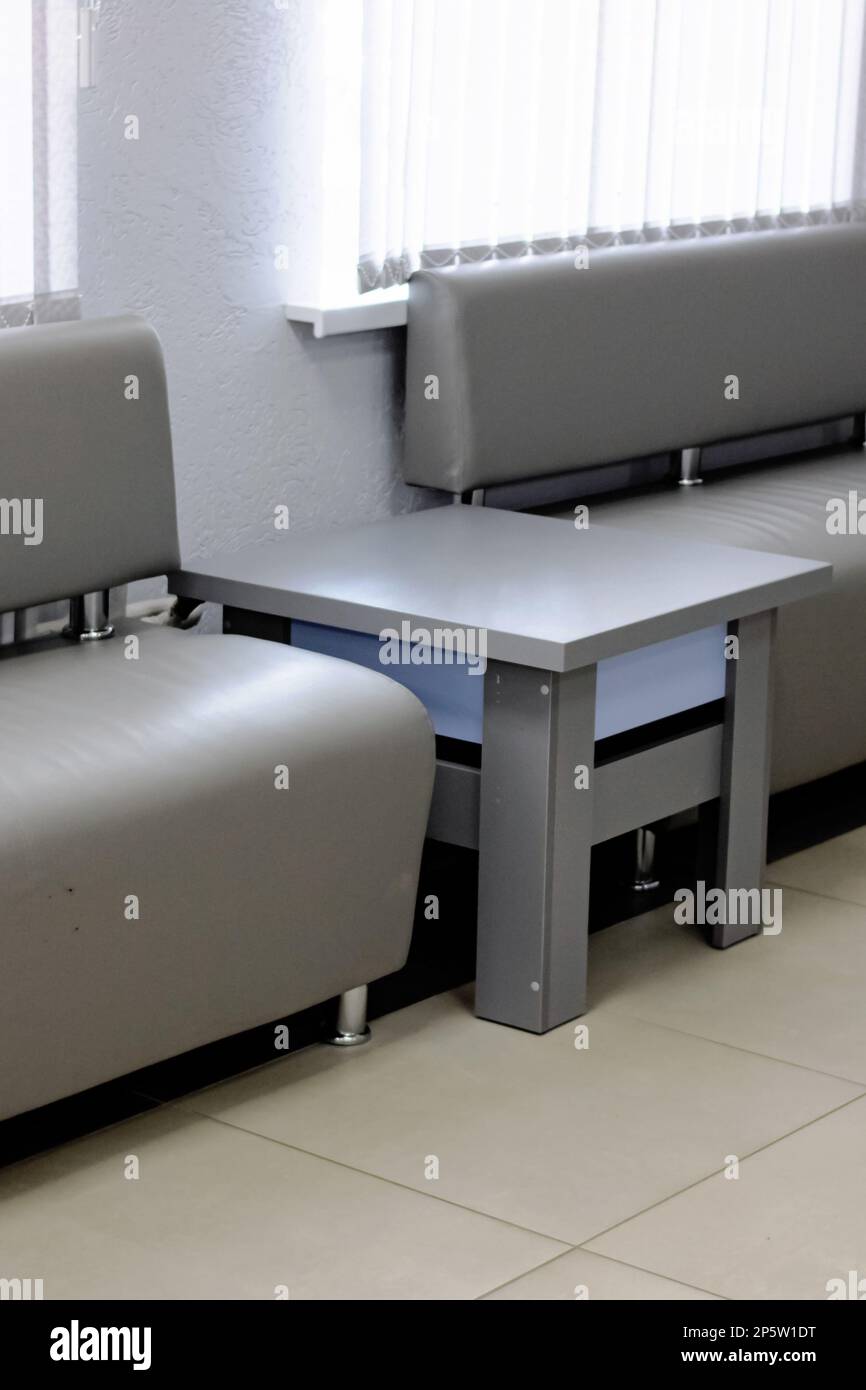 Sofas and tables in the waiting room close up Stock Photo - Alamy