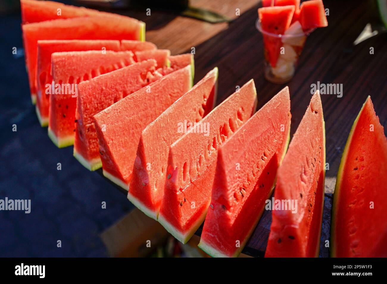 Watermelon vendors at a market in Urumqi, Xinjiang, China Stock Photo ...