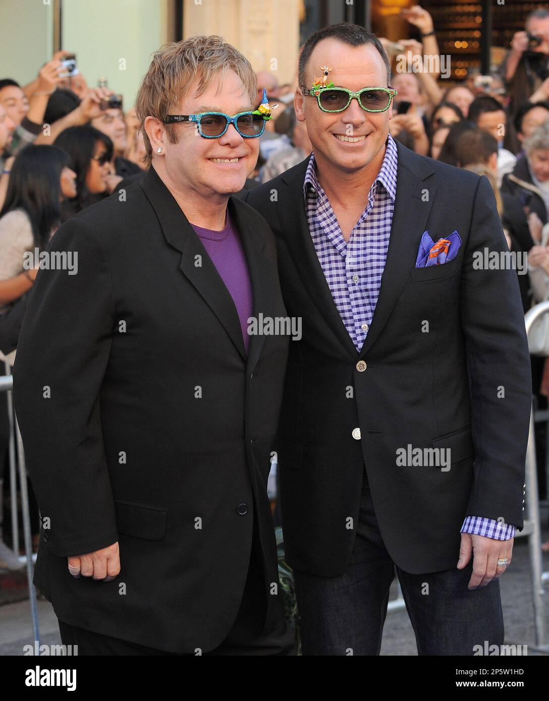 HOLLYWOOD, CA - JANUARY 23: Elton John and David Furnish arrive at the ...