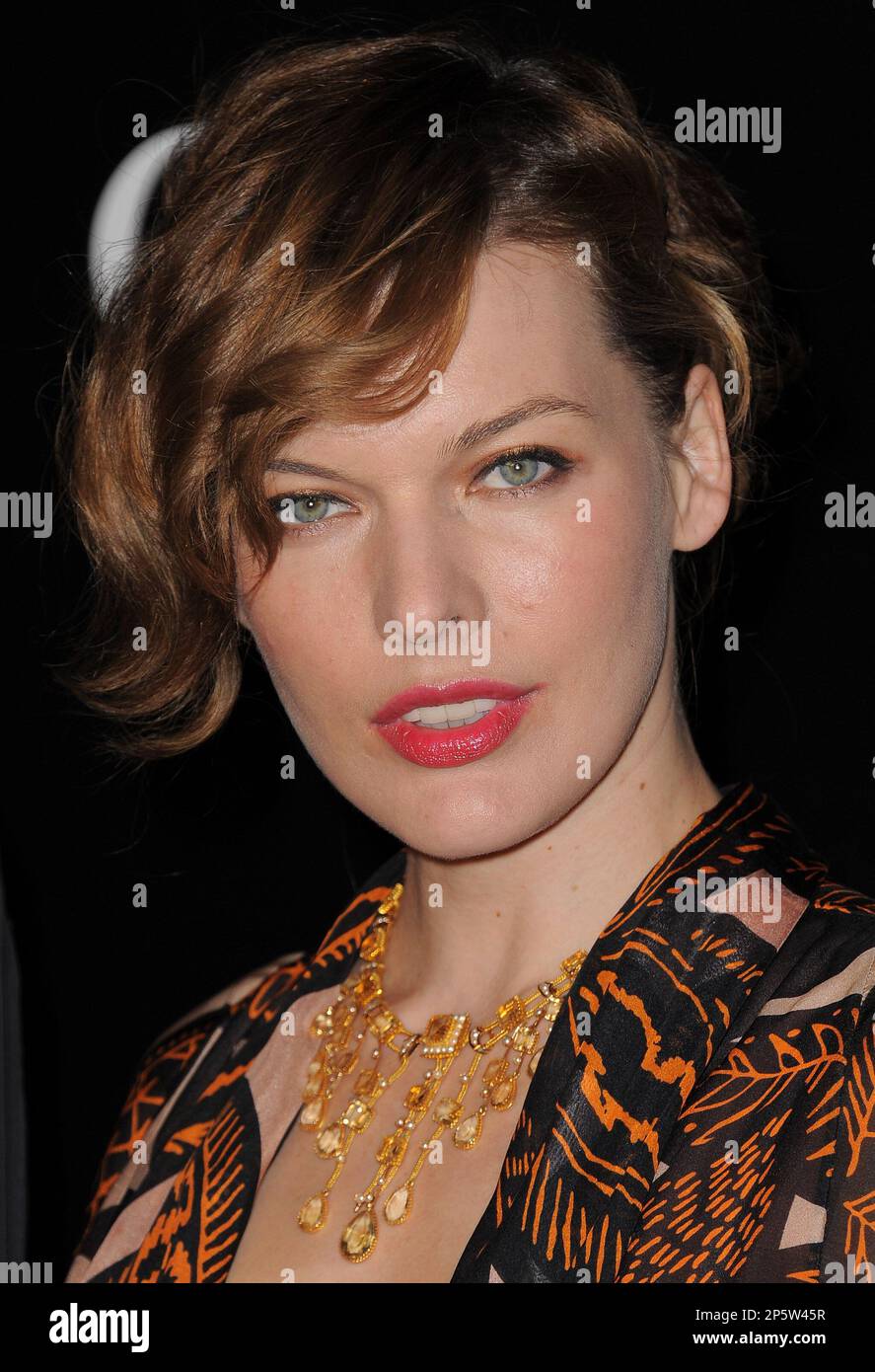 LOS ANGELES, CA - DECEMBER 14: Actress Milla Jovovich arrives at the ...