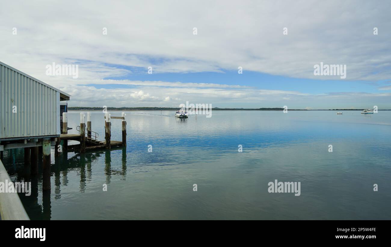 Passenger ferry approaches the Victoria Point jetty with a Laude blue ...