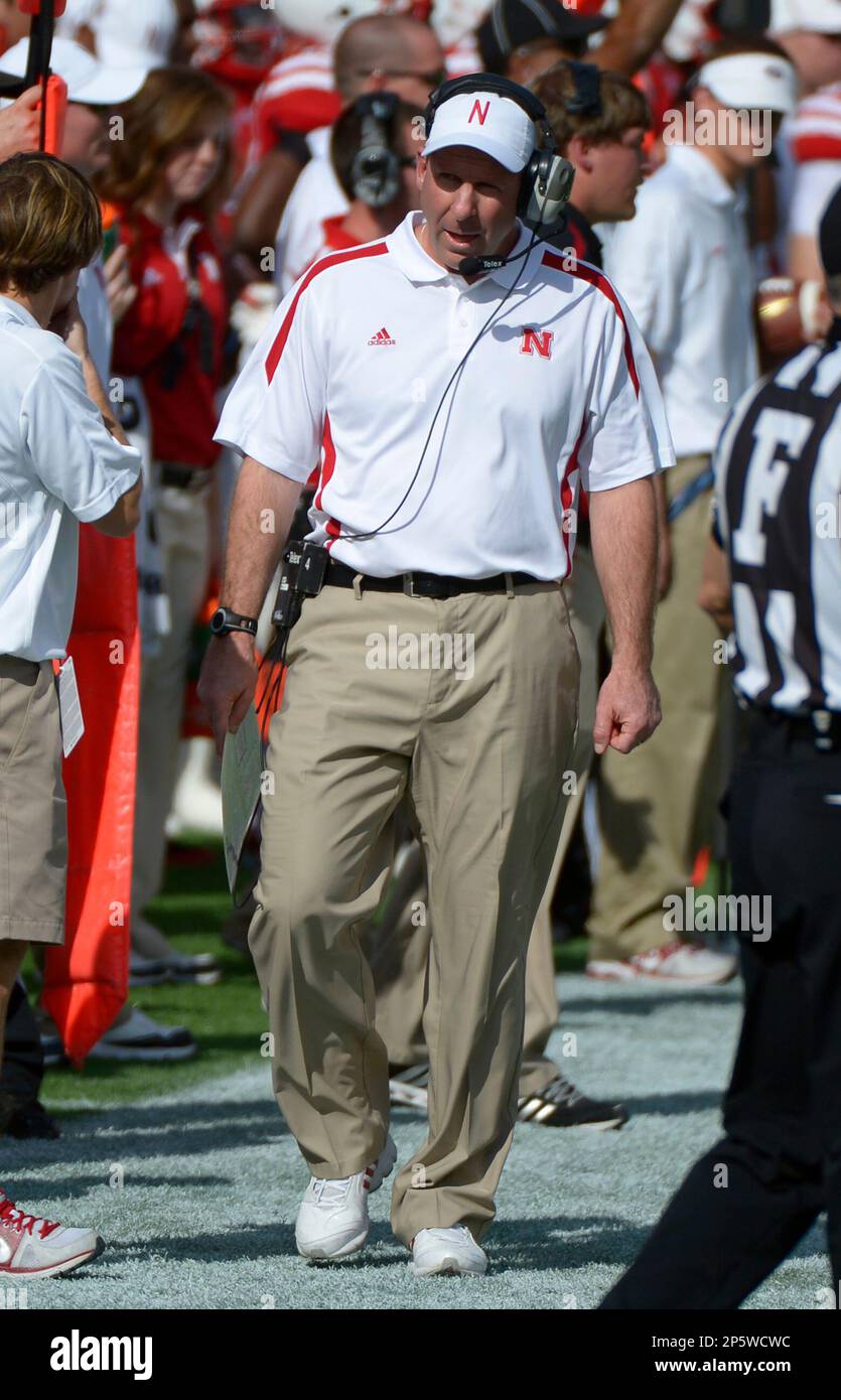 Nebraska head coach Bo Pelini walks the sideline during the first half ...