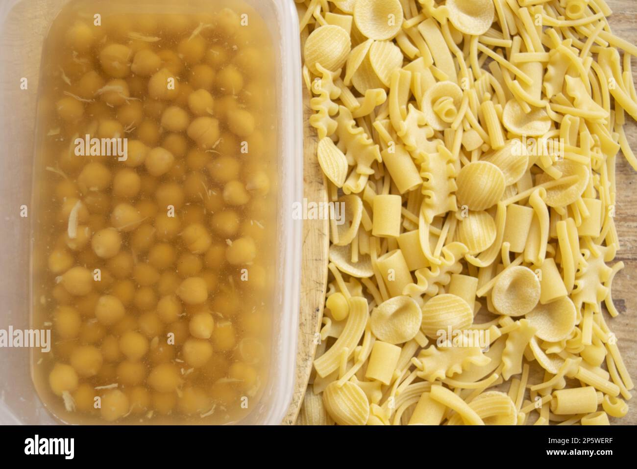 cooked chickpeas and mixed raw pasta for the preparation of pasta and ...