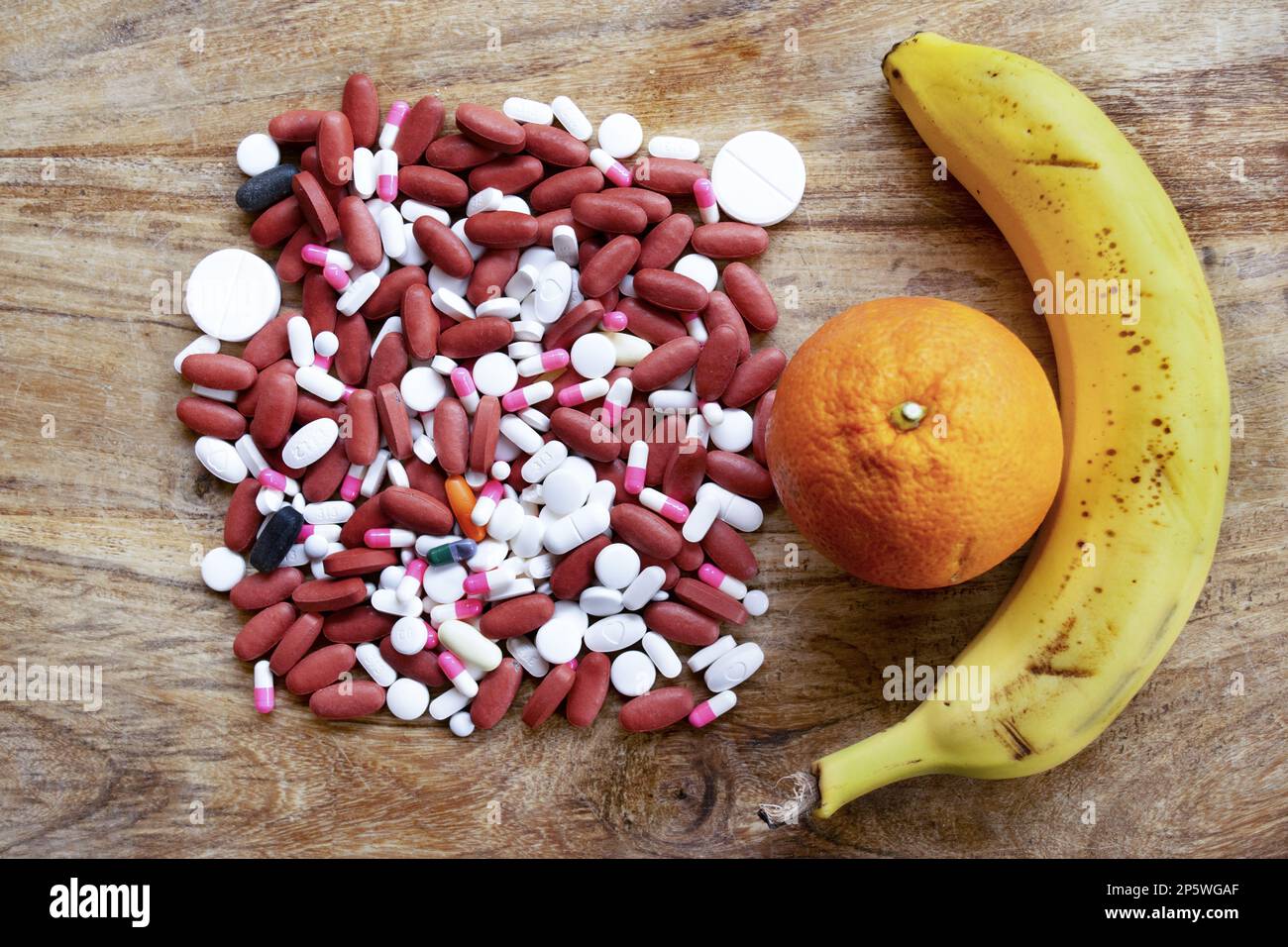food and health concept with a collection of pills and fruit Stock ...