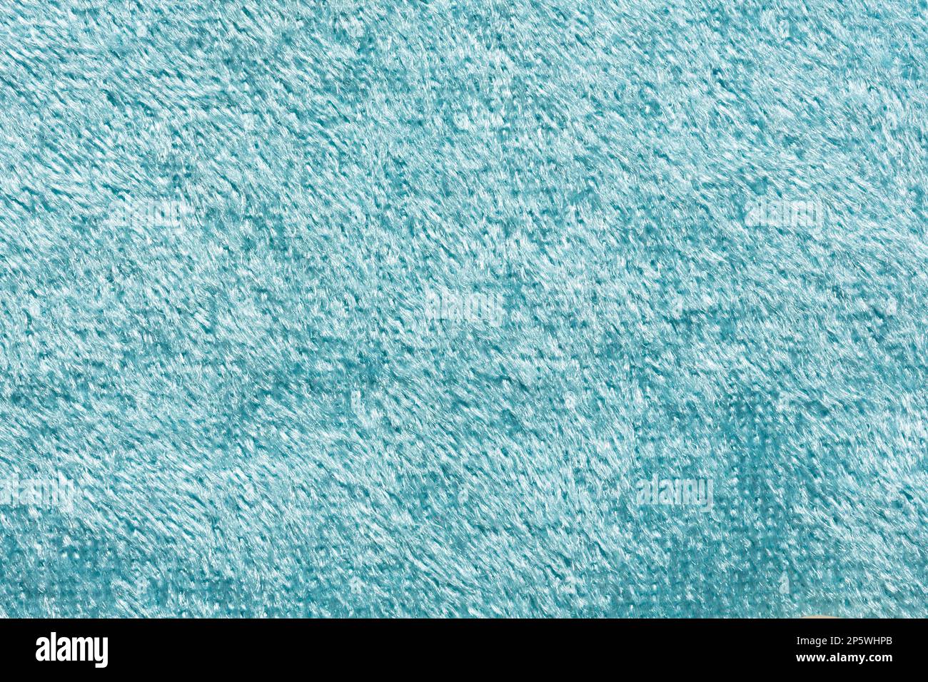 Light blue matte background of suede fabric, closeup. Velvet texture of ...
