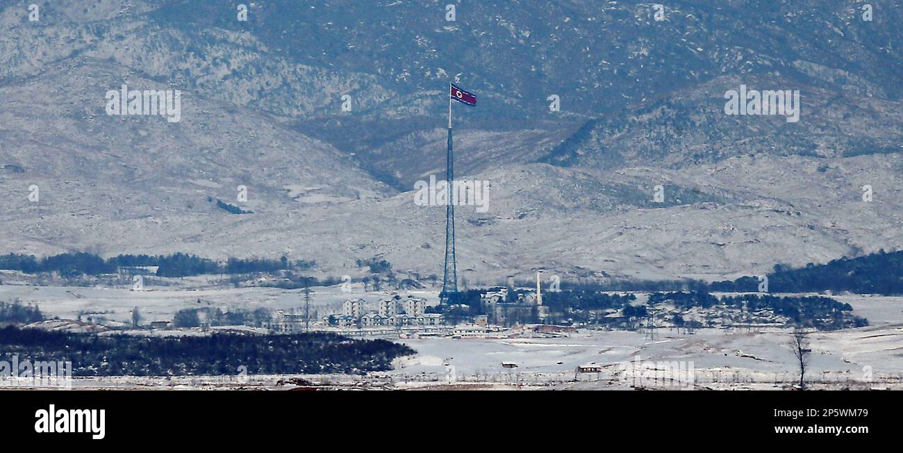 A giant North Korean flag flutters on the top of a 160-meter (533-foot ...