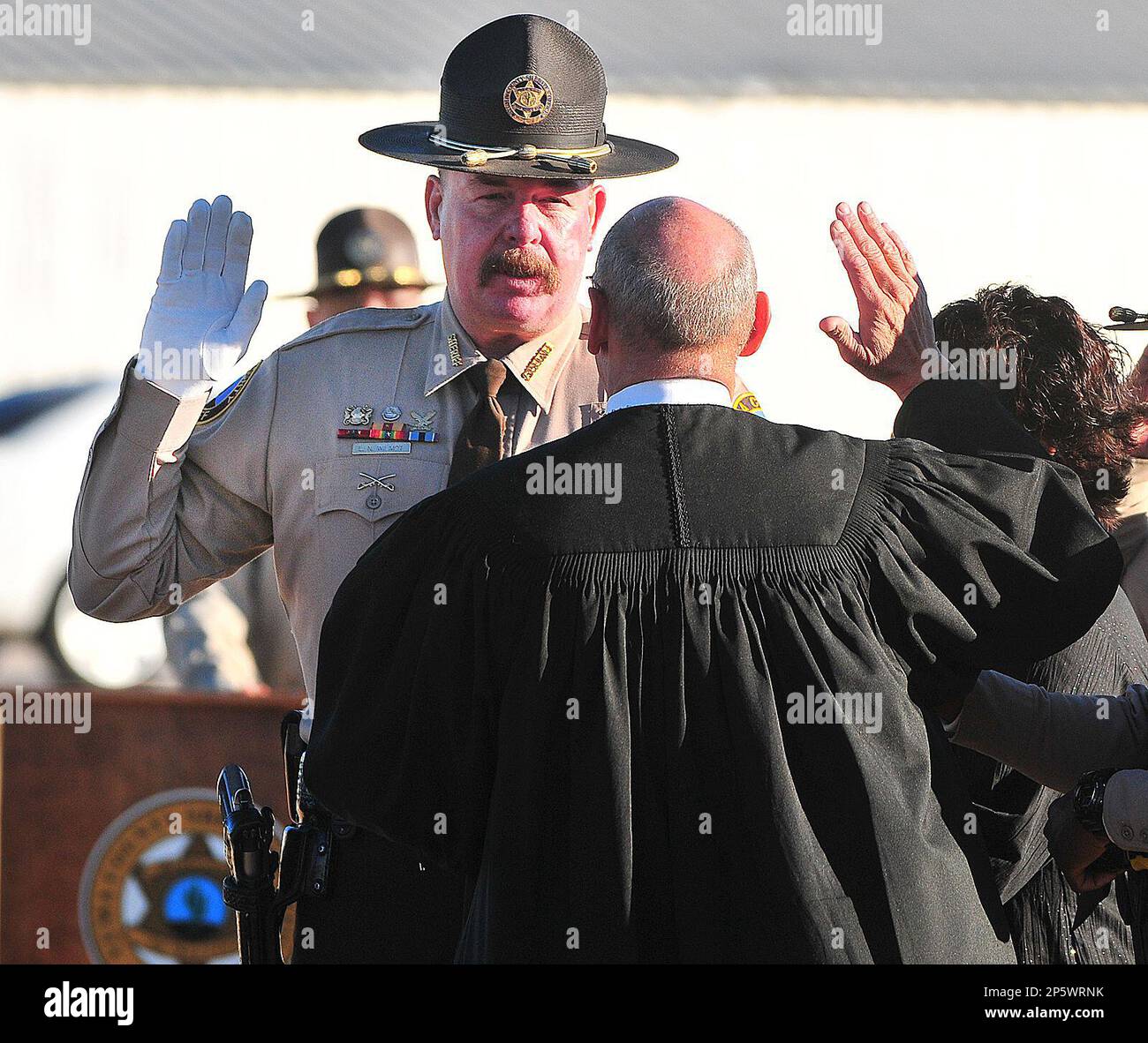 Yuma County Sheriff Leon Wilmot is given the oath of office by ...