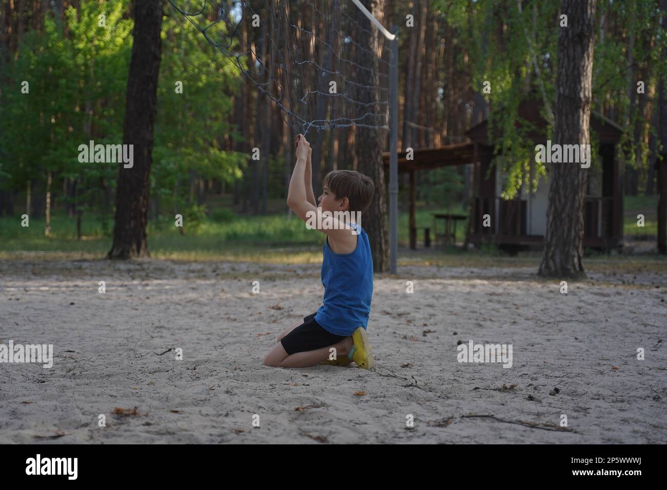 Cute boy having fun on outdoor playground. Summer active sport leisure ...