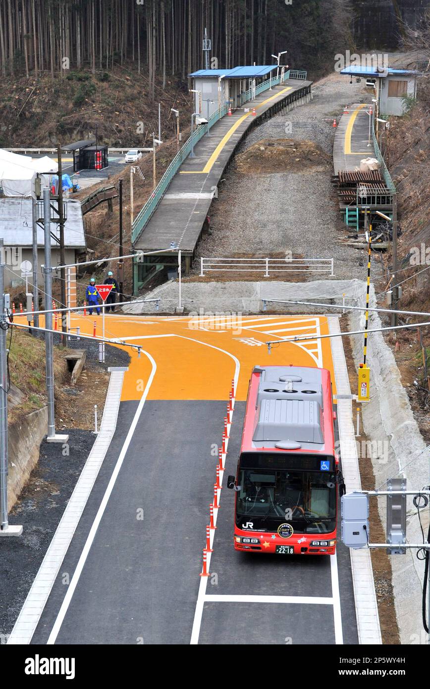A bus run s on a road designated for bus rapid transit (BRT) service in ...