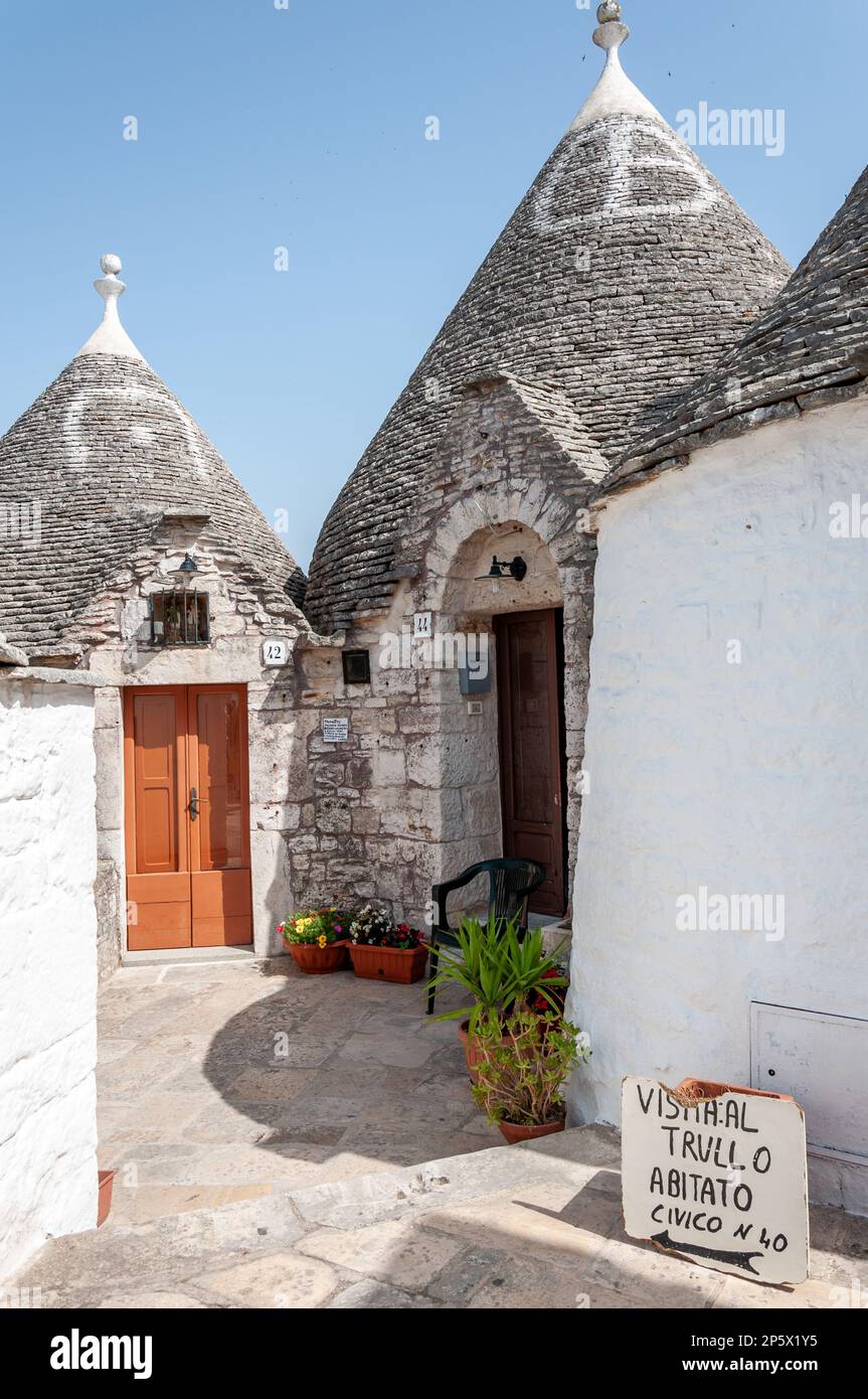 The Italian Trulli houses located in Alberobello, Puglia Region expose the traditional, medieval ...