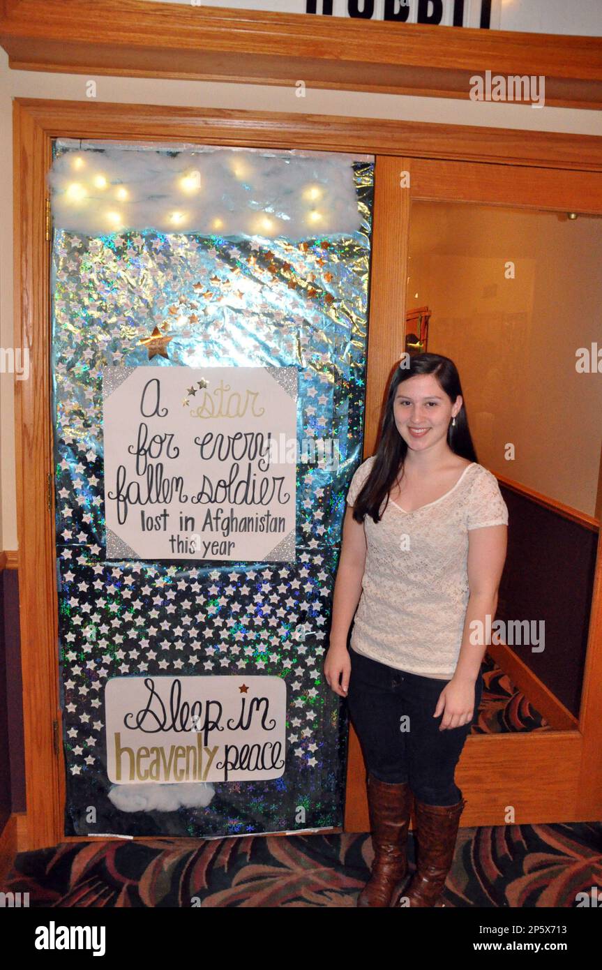 Sarah Polinski of Sayre, Pa., stands on Friday, Dec. 14, 2012, next to ...