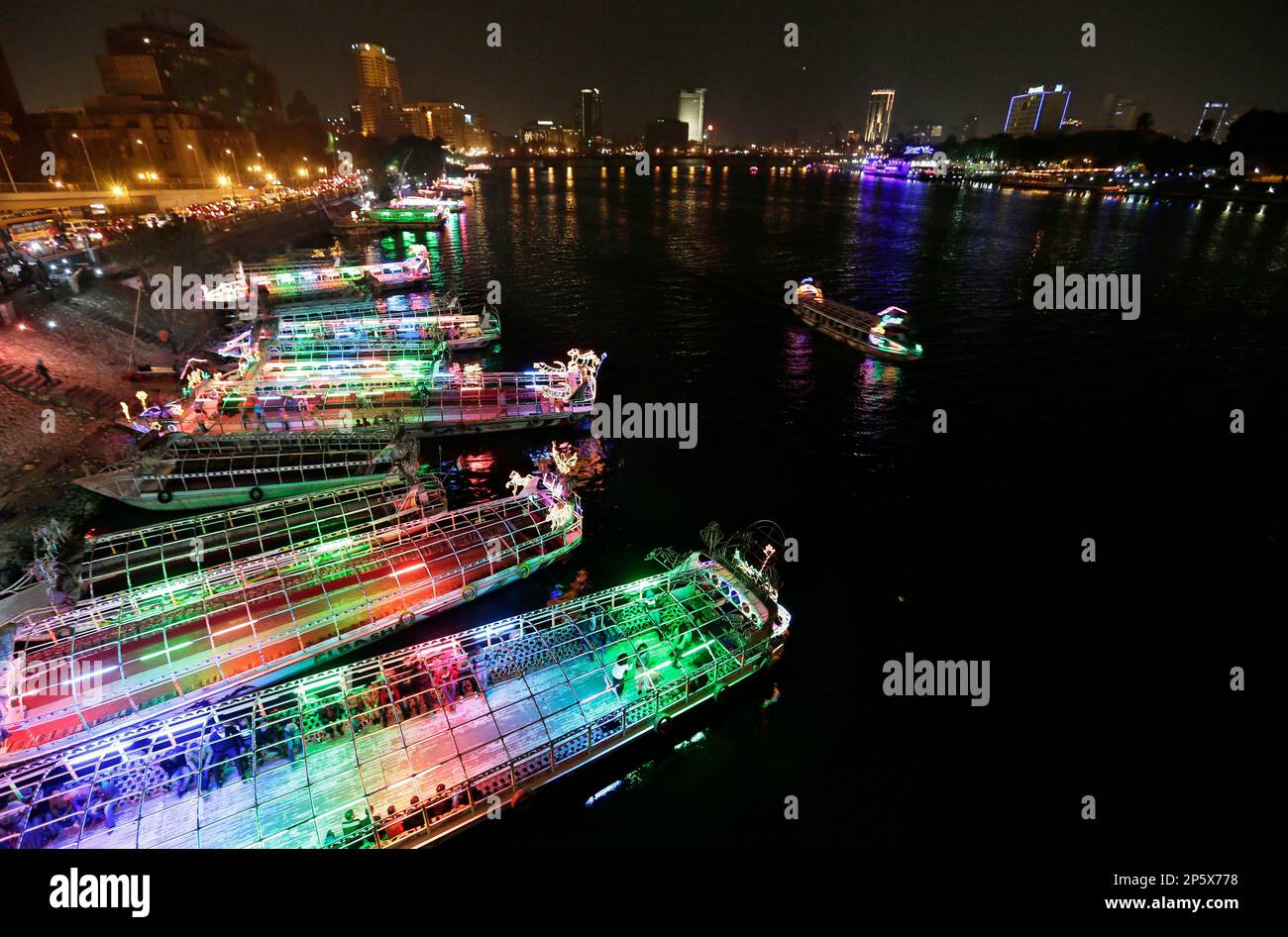 Boats parked waiting for customers on the Nile river, in Cairo, Egypt ...