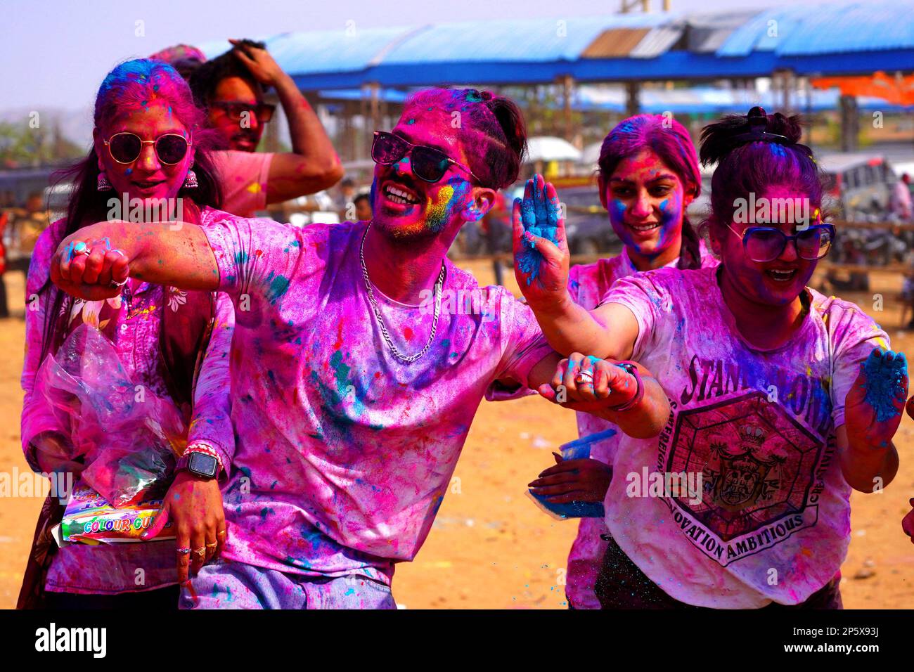 India. 07th Mar, 2023. Indian devotees and foreign tourists take part ...