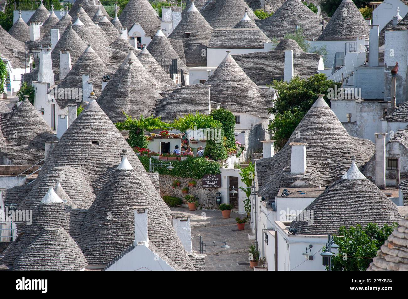 The Italian Trulli houses located in Alberobello, Puglia Region expose the traditional, medieval ...
