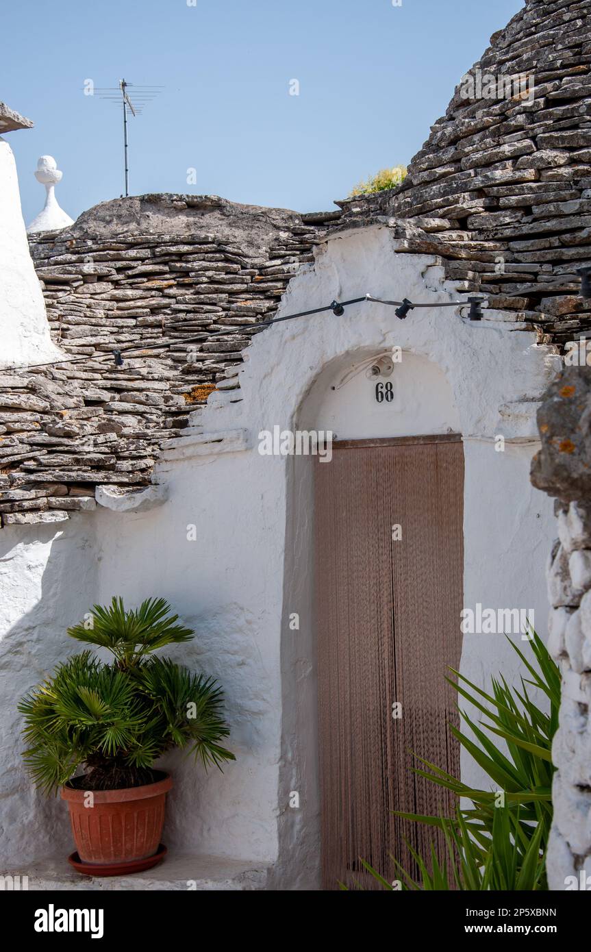 The Italian Trulli houses located in Alberobello, Puglia Region expose ...