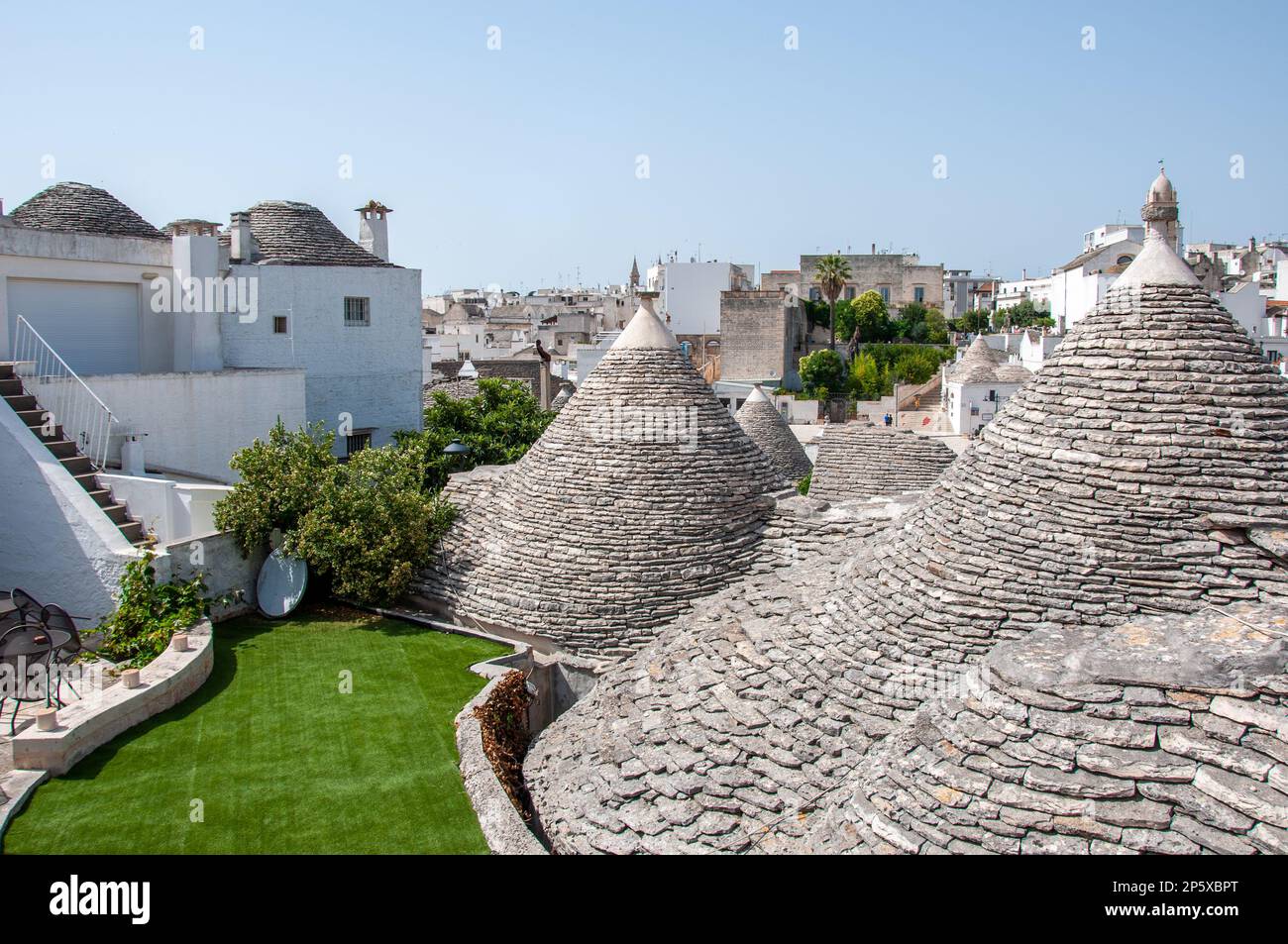 The Italian Trulli houses located in Alberobello, Puglia Region expose the traditional, medieval ...