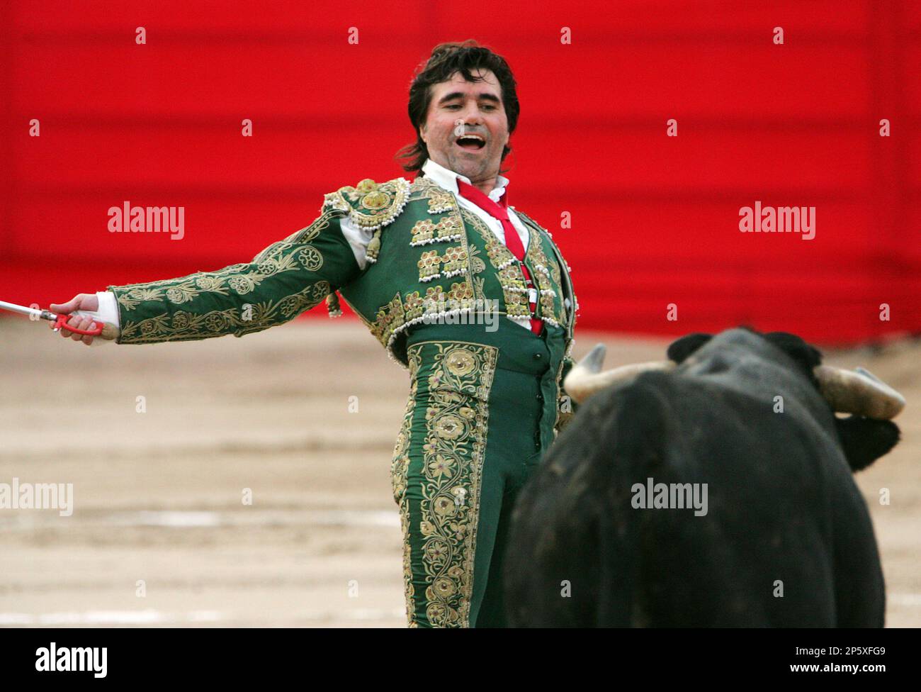 Professional bullfighter Jorge de Jesus "El Glison" taunts a bull in ...