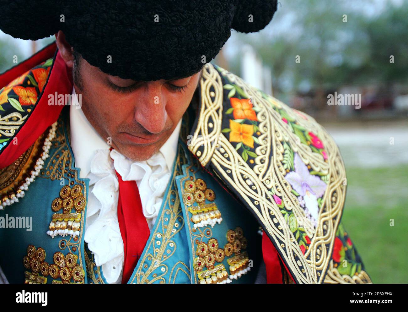 Professional bullfighter Manolo Martinez Jr. prepares his cape before ...