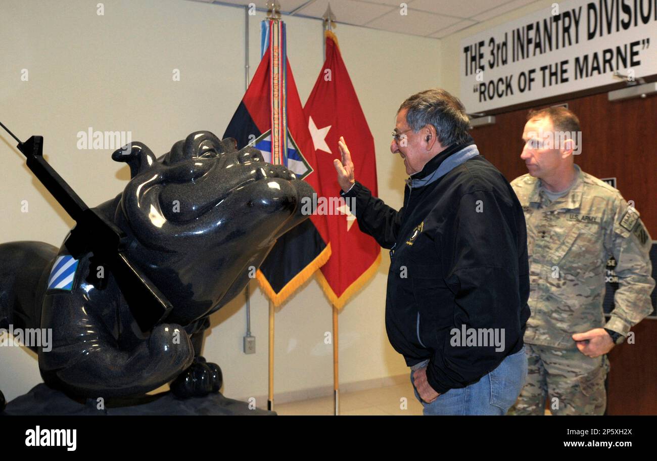 Defense Secretary Leon Panetta looks at the 3rd Infantry Division ...