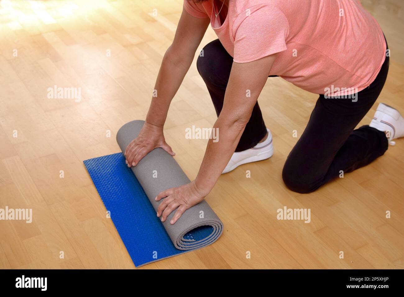 fitness mat is rolled up Stock Photo - Alamy