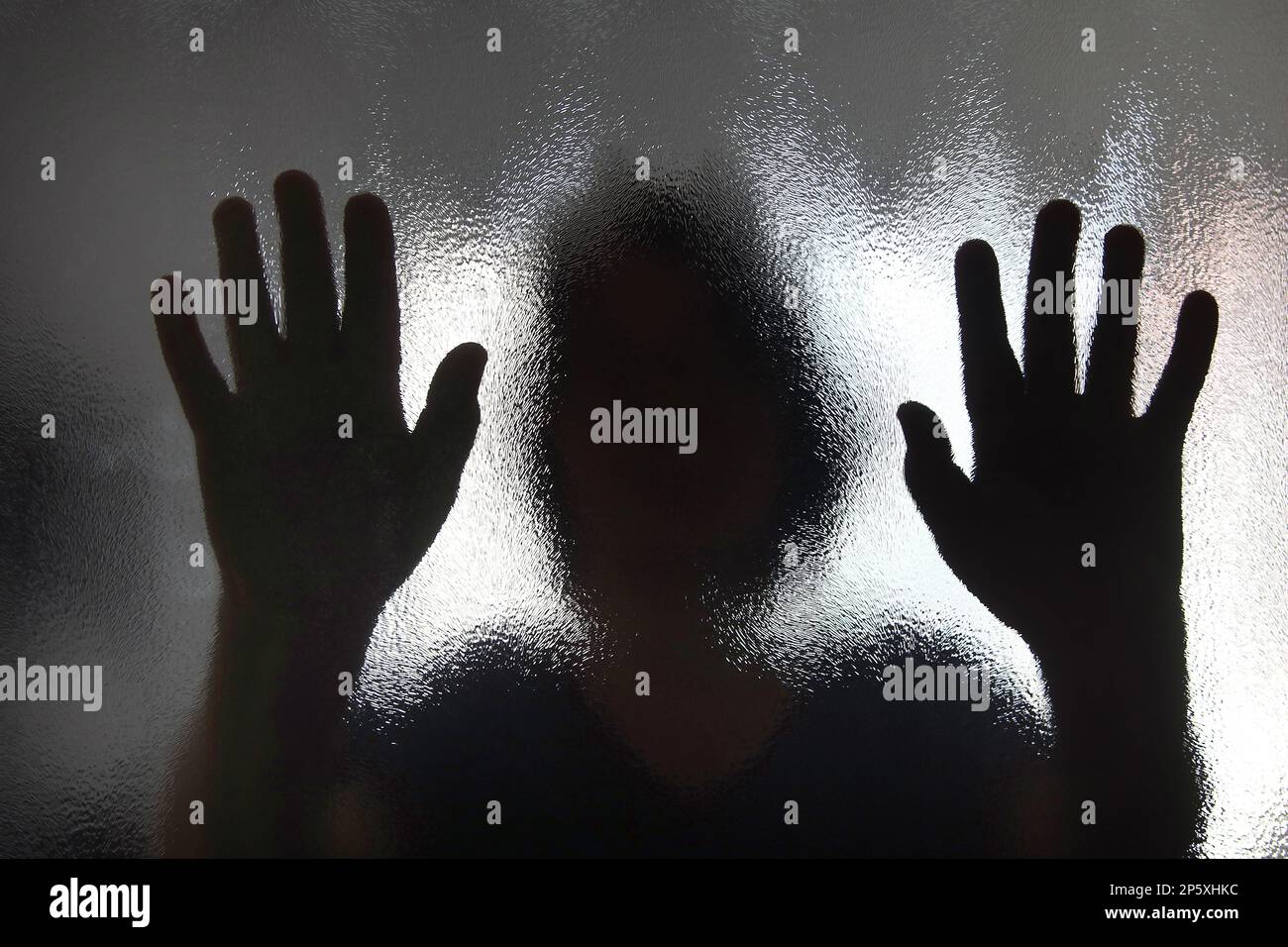 shape and hands on a frosted glass pane Stock Photo - Alamy