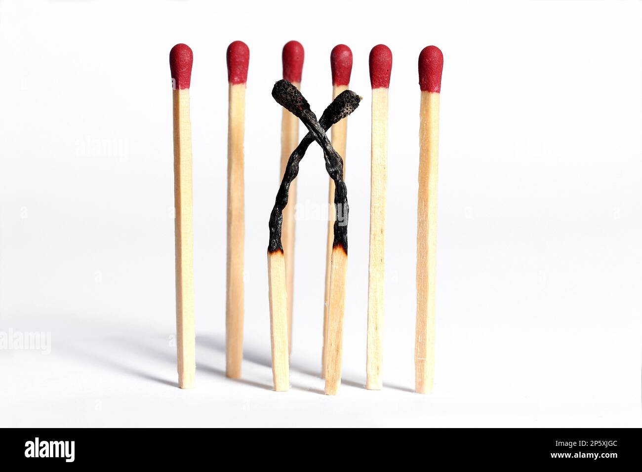 group of matches, two burnt off Stock Photo - Alamy