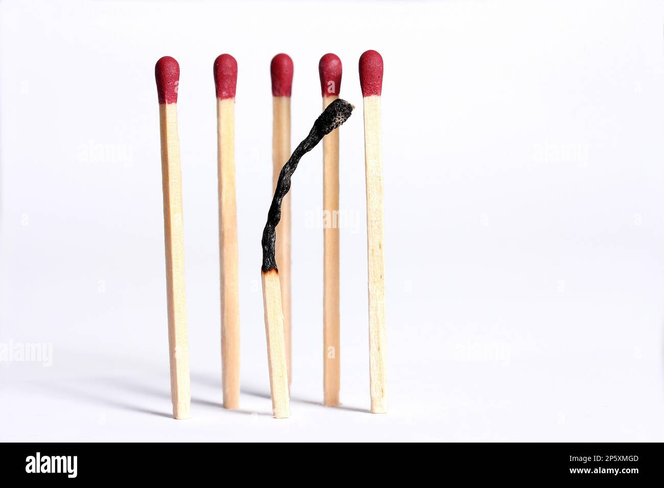 group of matches, a single one burnt off Stock Photo - Alamy