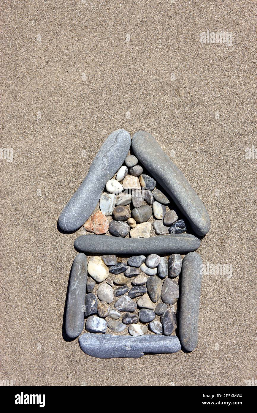 outline of a house of stones in the sand Stock Photo - Alamy