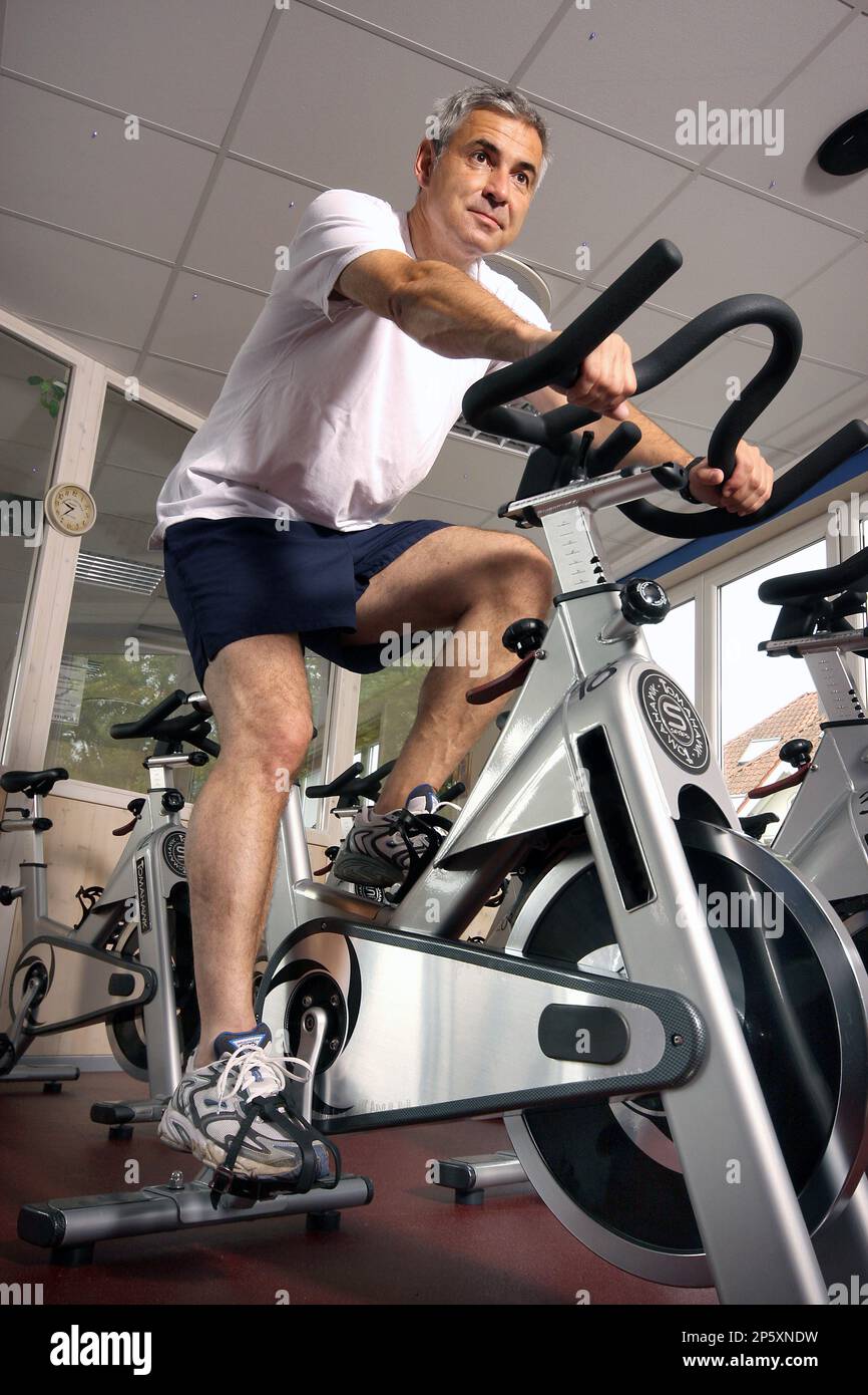 Gym bike man hi-res stock photography and images - Alamy