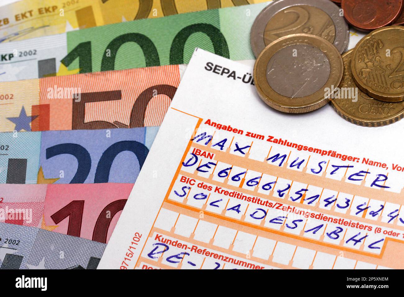 analog SEPA credit transfer and Euro bills and coins Stock Photo - Alamy
