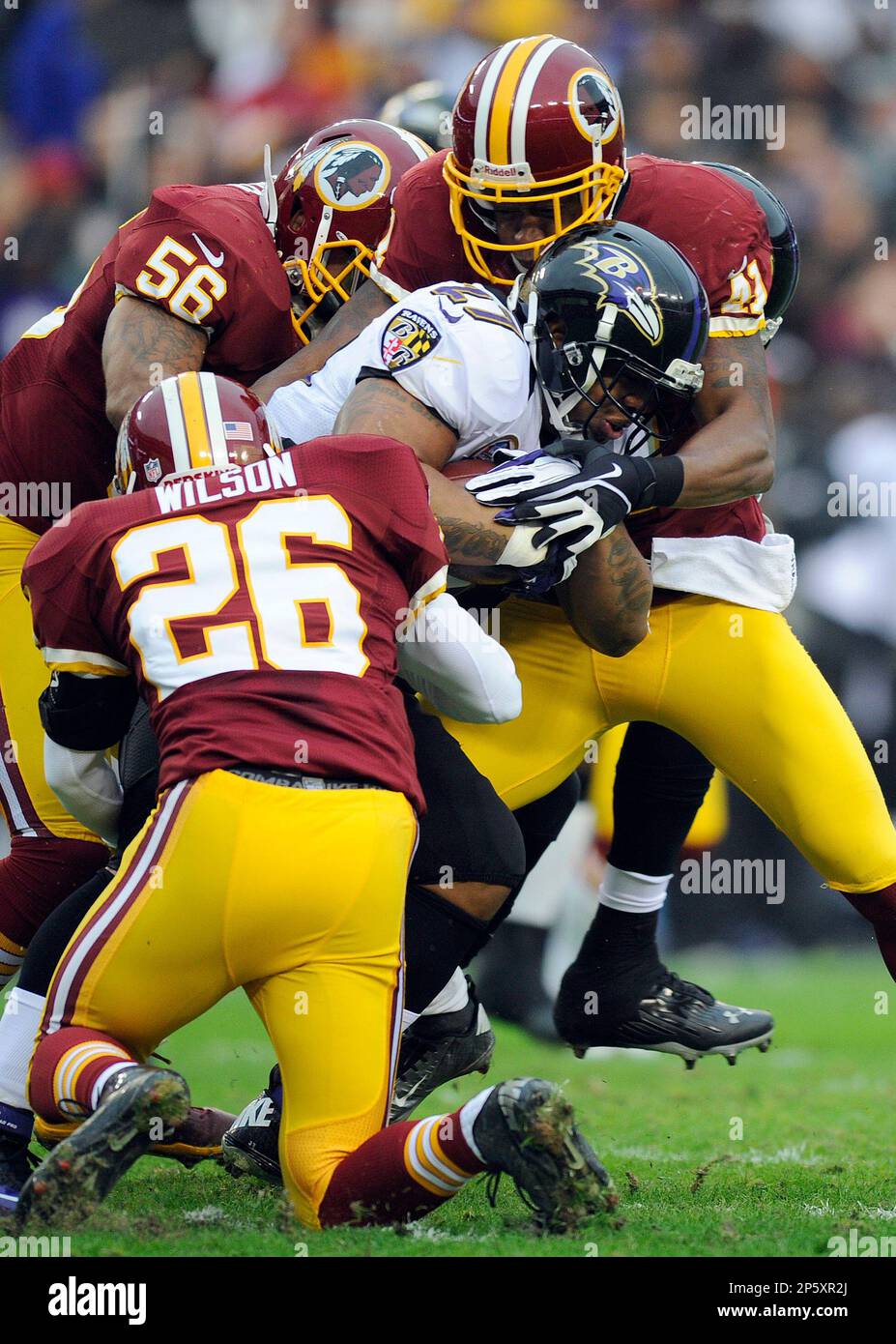 Baltimore Ravens running back Ray Rice is wrapped up by Washington ...