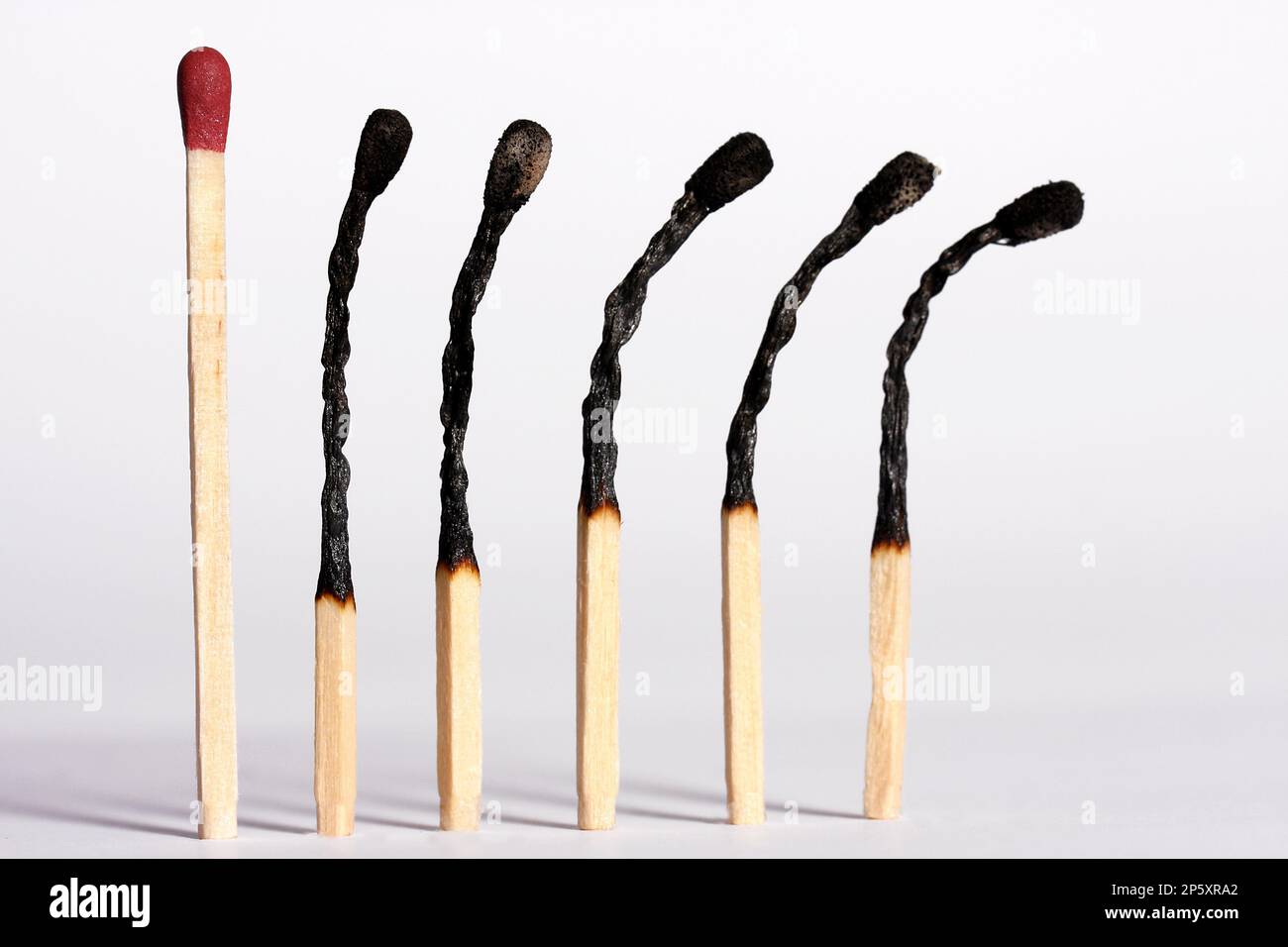 group of matches, burnt off with the exception of one Stock Photo - Alamy