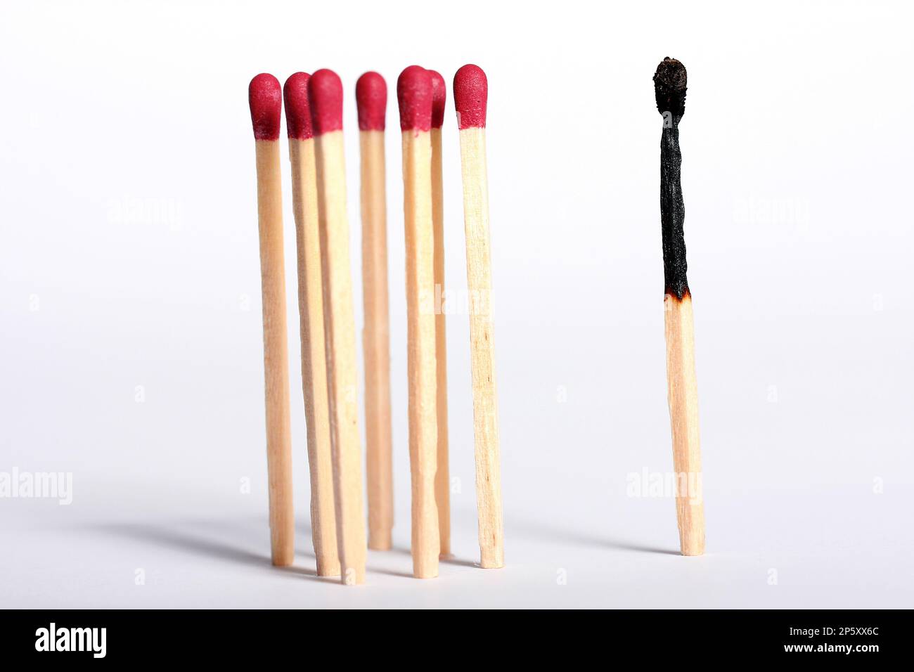 group of matches, a single one burnt off Stock Photo - Alamy