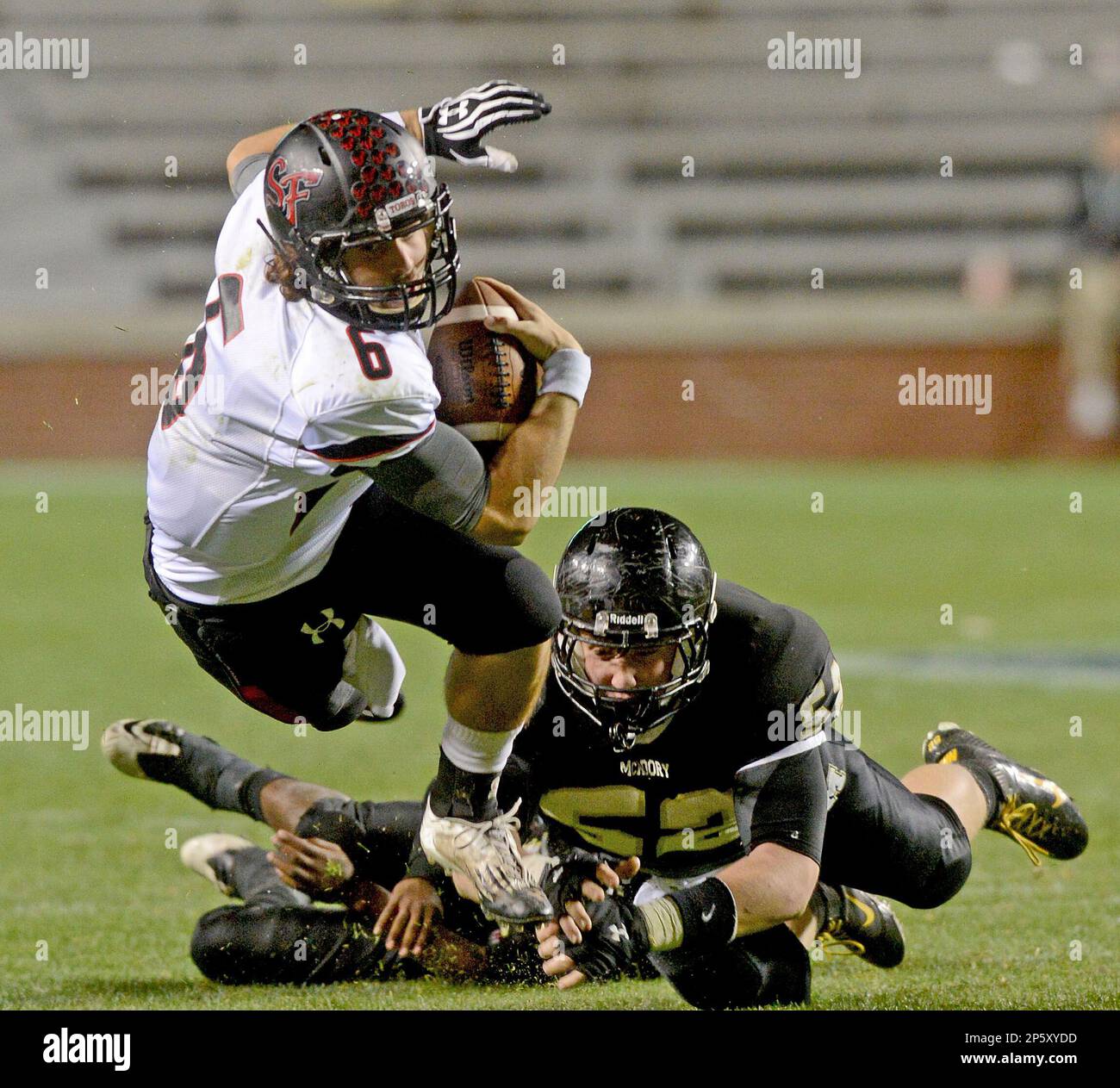 Spanish Fort's Joel Poe is tripped up by McAdory's Taylor Reynolds ...