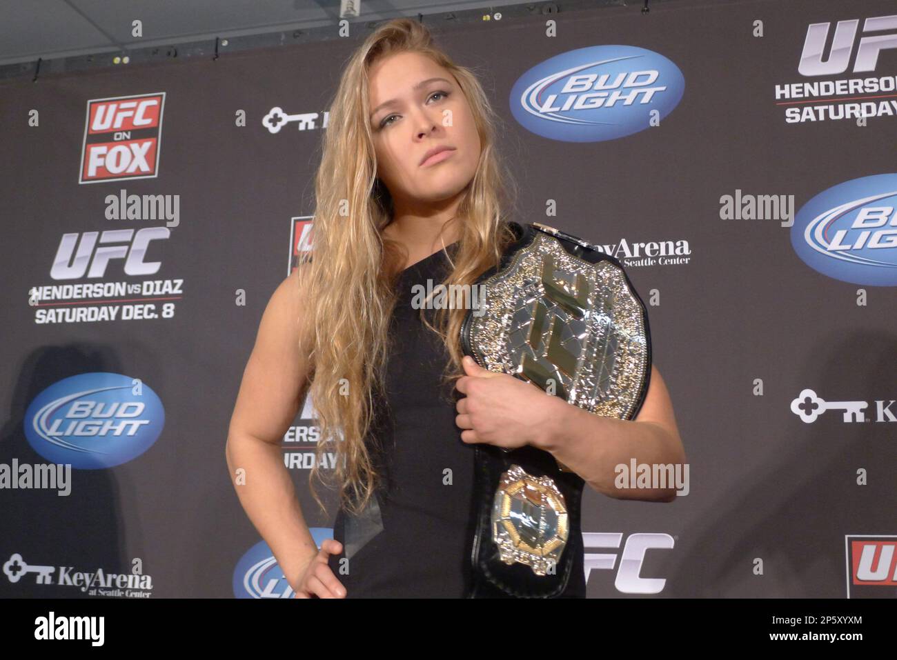 Ronda Rousey shows off her UFC bantamweight championship belt during a ...