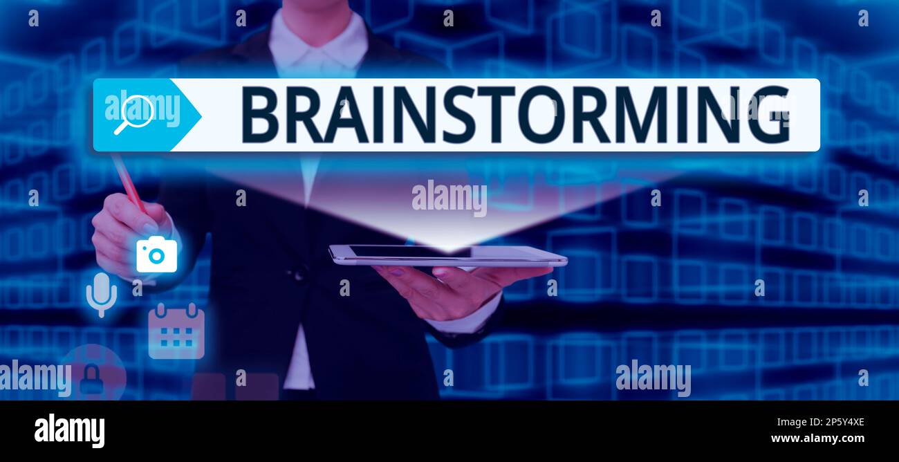 Handwriting text Brainstorming. Internet Concept Hold a group ...