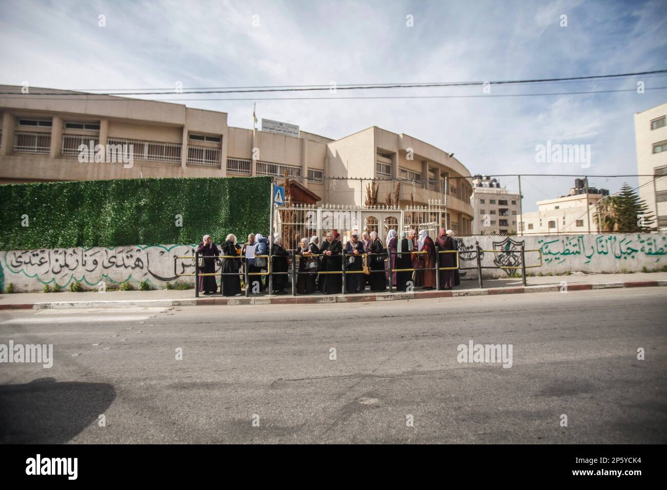 Nablus, Palestine - 07 Mar 2023, Palestinian school teachers stand in front of their closed ...