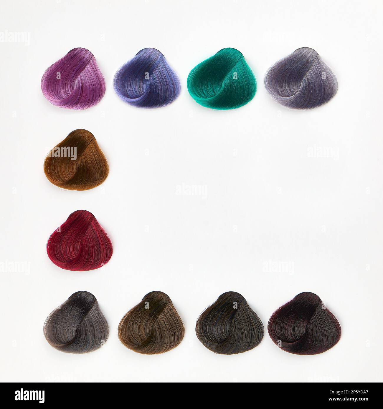 Professional pallet with hair dye samples close up, space for text ...