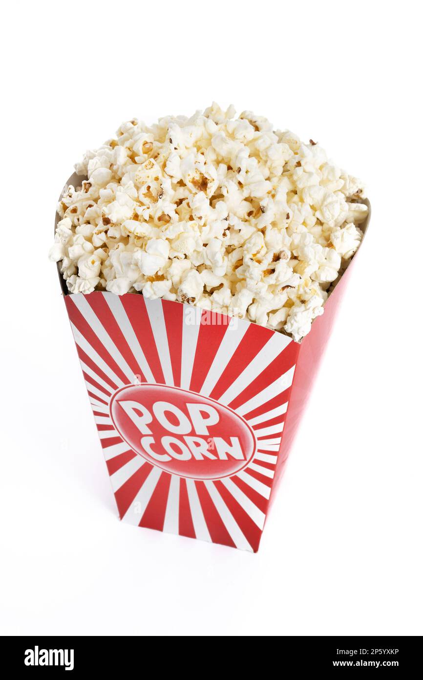 Popcorn in red and white striped cardboard bucket isolated on white ...