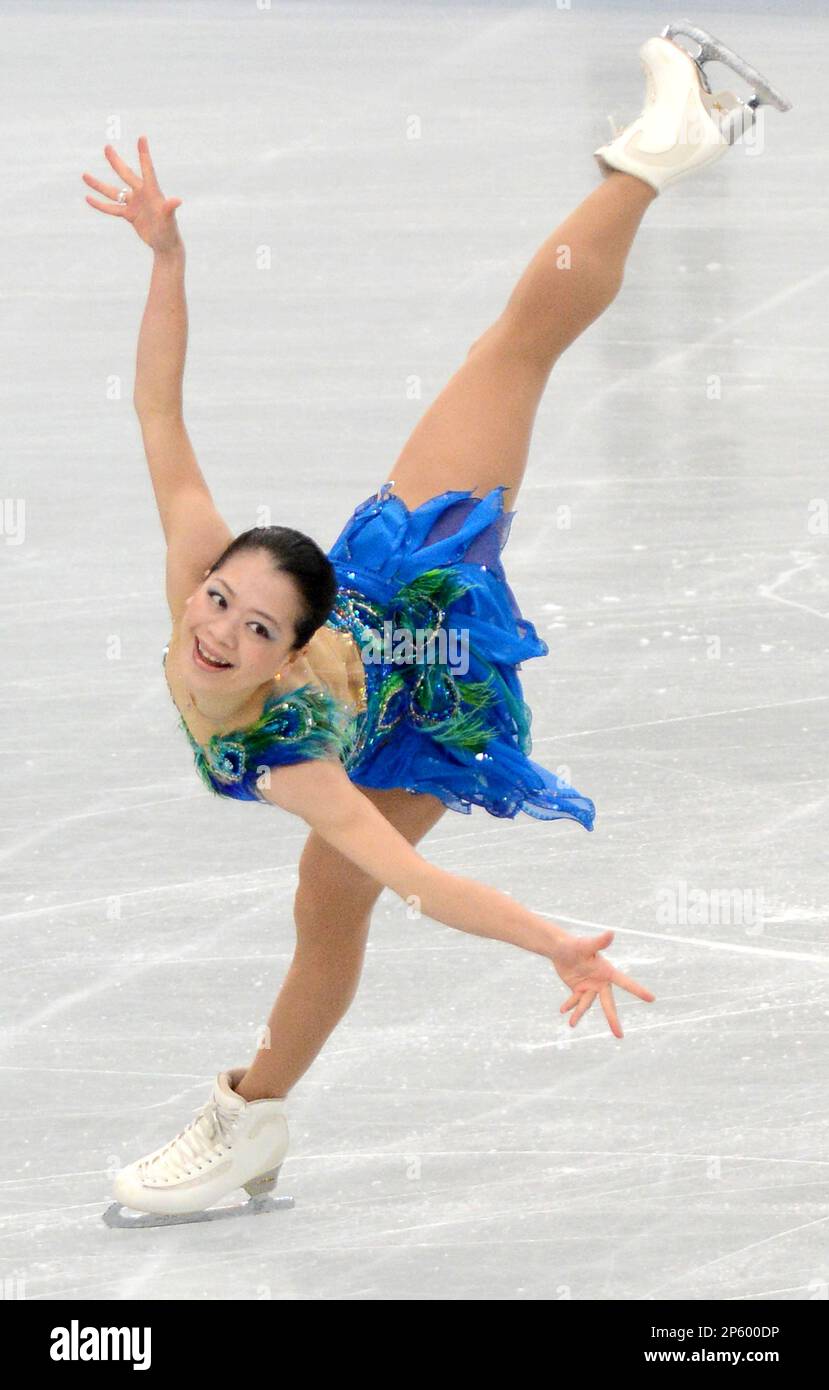 Akkiko Suzuki of Japan reacts after performing in the women's free ...